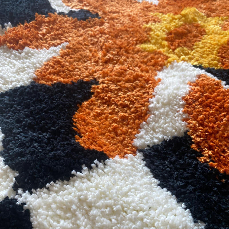 Checkered Orange Flower Accent Rug - Shop Online on roomtery